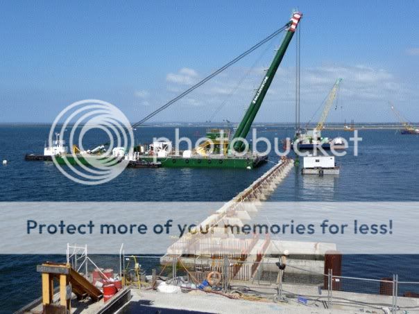 land reclamation,shear leg barge crane and 4600 ringer pics.....pic ...