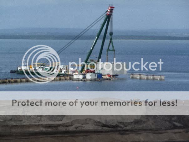 land reclamation,shear leg barge crane and 4600 ringer pics.....pic ...